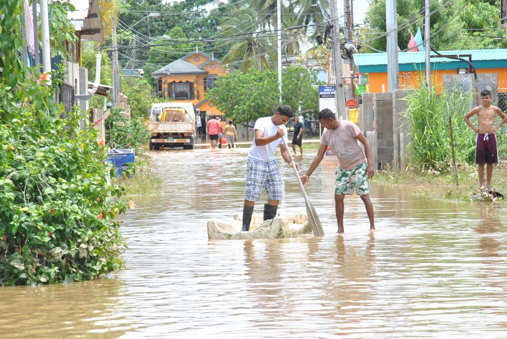 Distraught Bamboo residents... - Trinidad Guardian