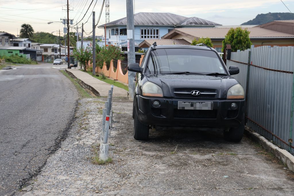 Residents call for pavement barriers to be removed - Trinidad Guardian