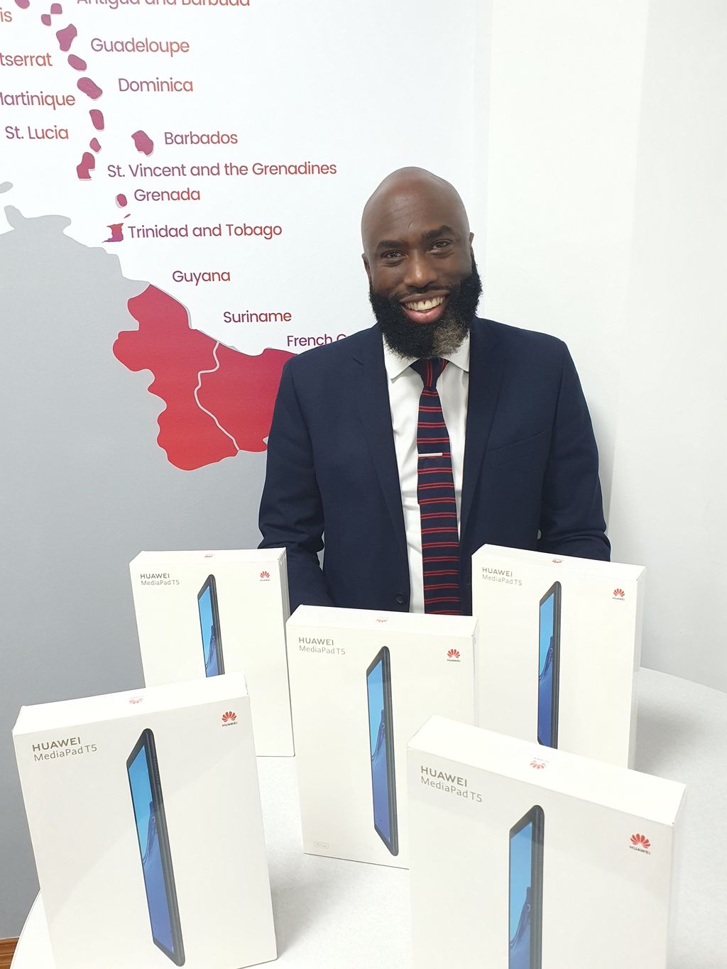 Digicel donates almost 2,000 devices to students - Trinidad Guardian