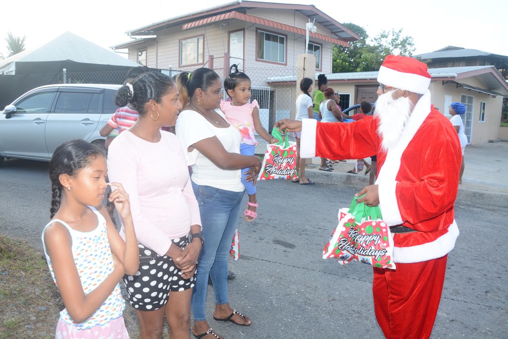 Hajaree family gives hampers to less fortunate community - Trinidad ...