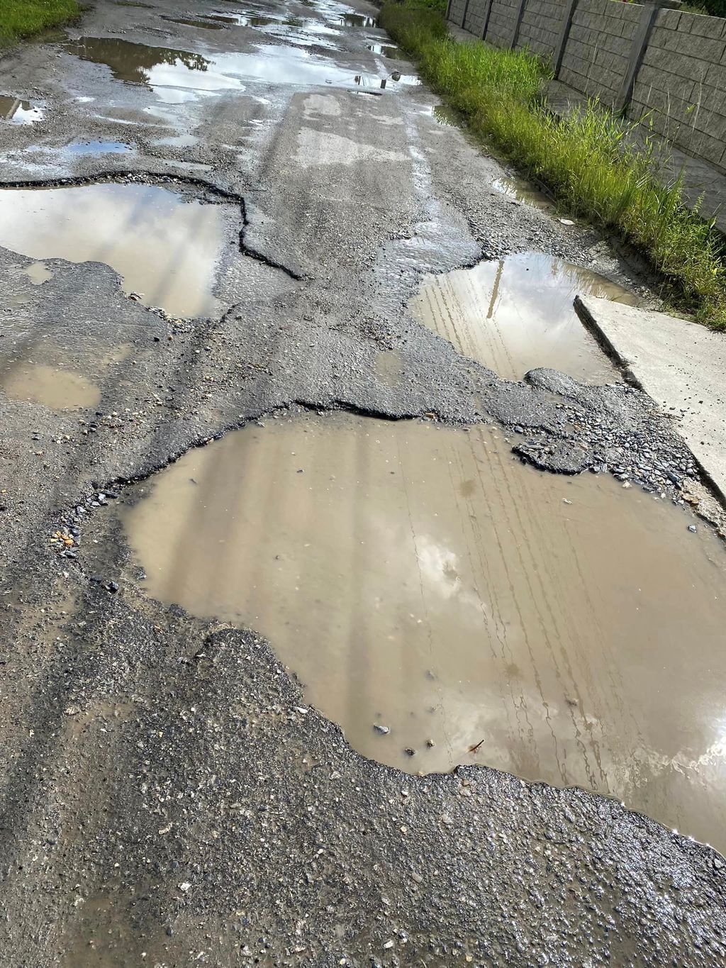 Bad road sours Boodoo Highway residents - Trinidad Guardian