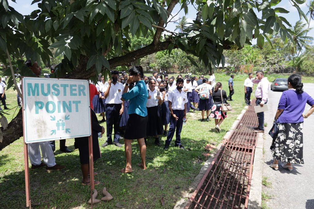 Parents pick up students of Iere High School following bomb threat ...