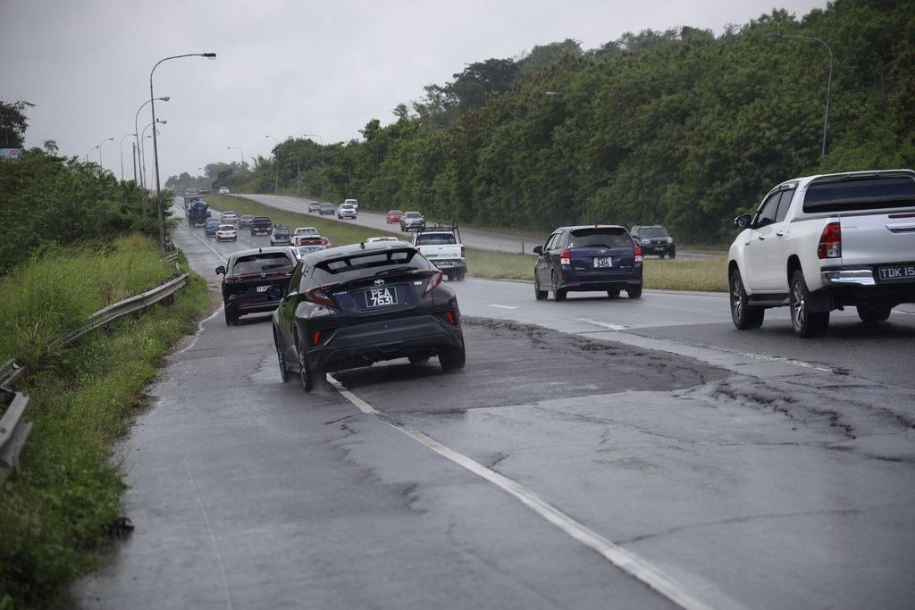 Motorists want depression along highway fixed - Trinidad Guardian