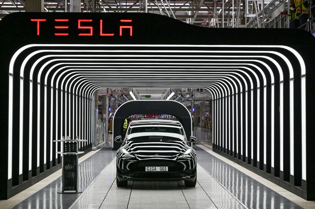 Tesla puts German factory production on hold as Red Sea attacks disrupt ...