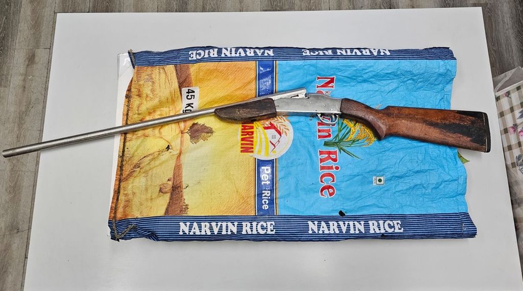 Gang Intel Officers intercept man walking with shotgun - Trinidad Guardian