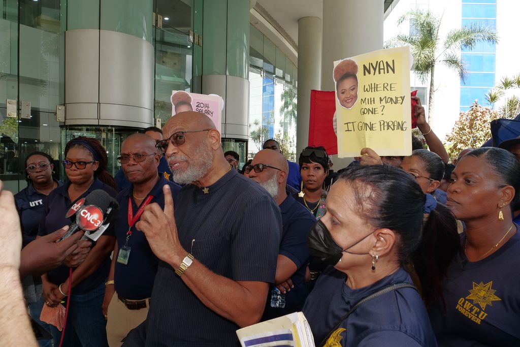 UWI, UTT workers protest over wage talks outside minister’s office ...