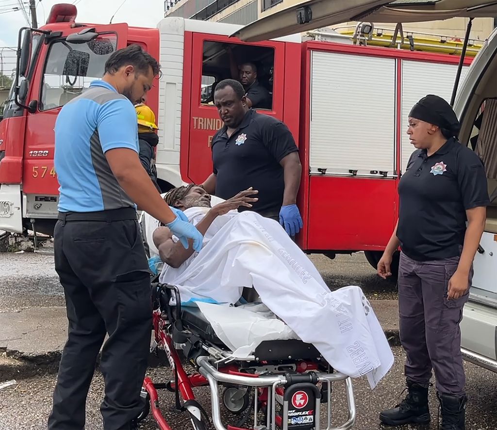 Homeless man rescued from floodwaters in PoS river - Trinidad Guardian